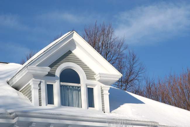 Why You Need Rooftop Snow Removal Services | Weldon Roofing